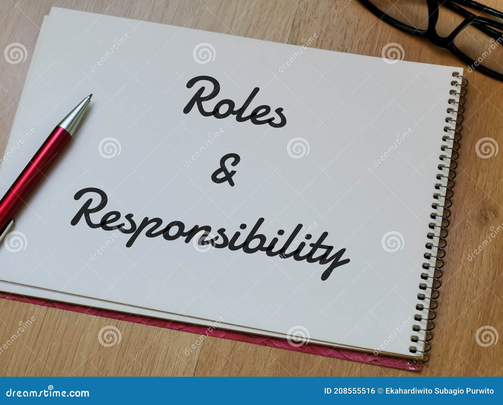 Text Roles And Responsibilities On White Paper Plate In Businessman ...