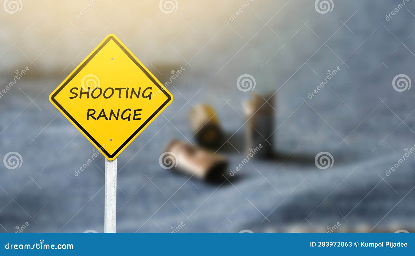 The Text Shooting Range on Yellow Sign with Blurred Bullets and Blue in ...