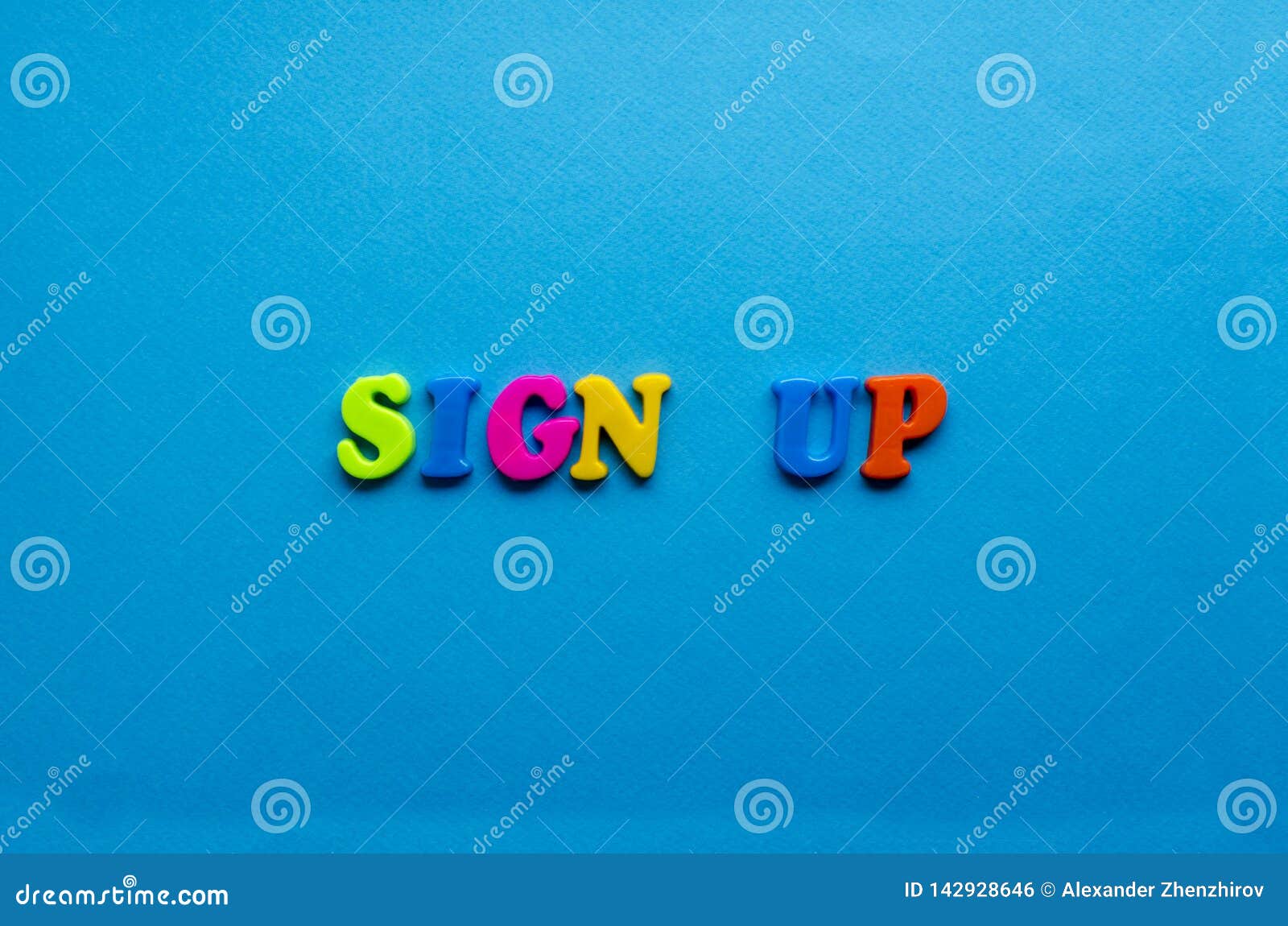 Text Sign Up from Plastic Colored Letters on Blue Paper Background ...