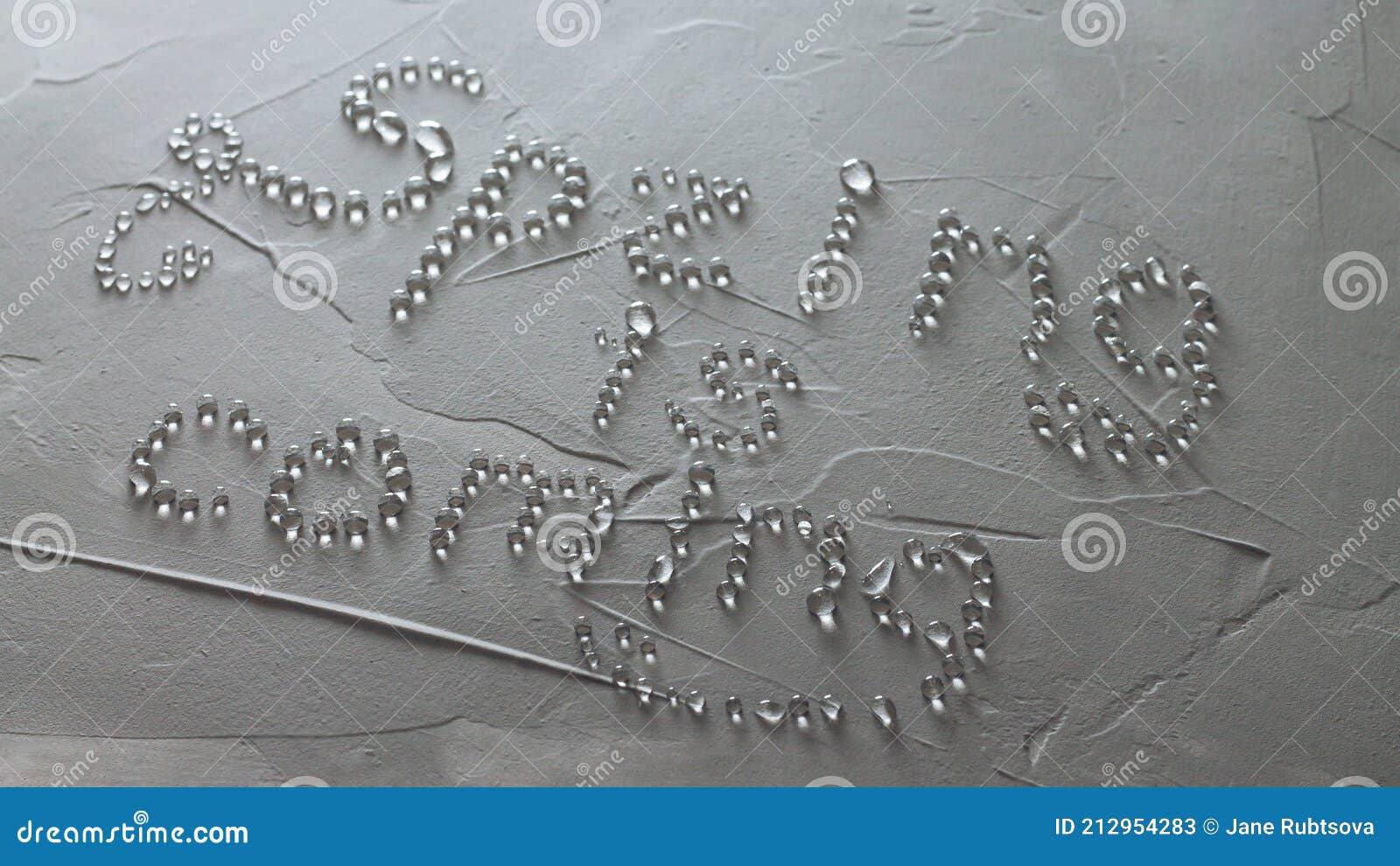 Text Spring is Coming Written with Water Droplets on Gray Concrete ...