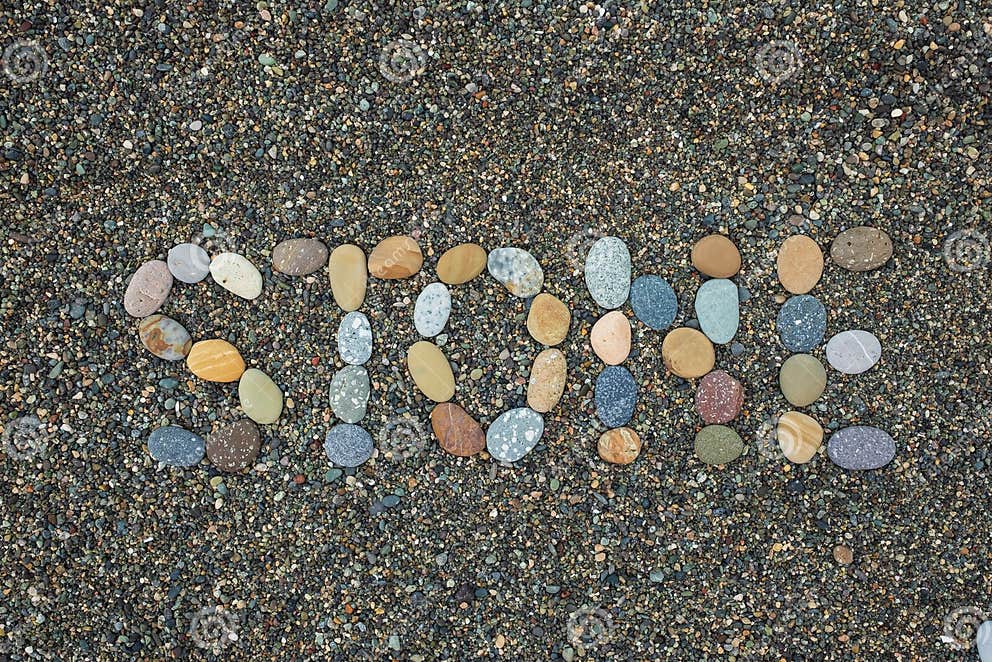 Text Stone Made from Stones on Sandy Beach. Stock Photo - Image of ...