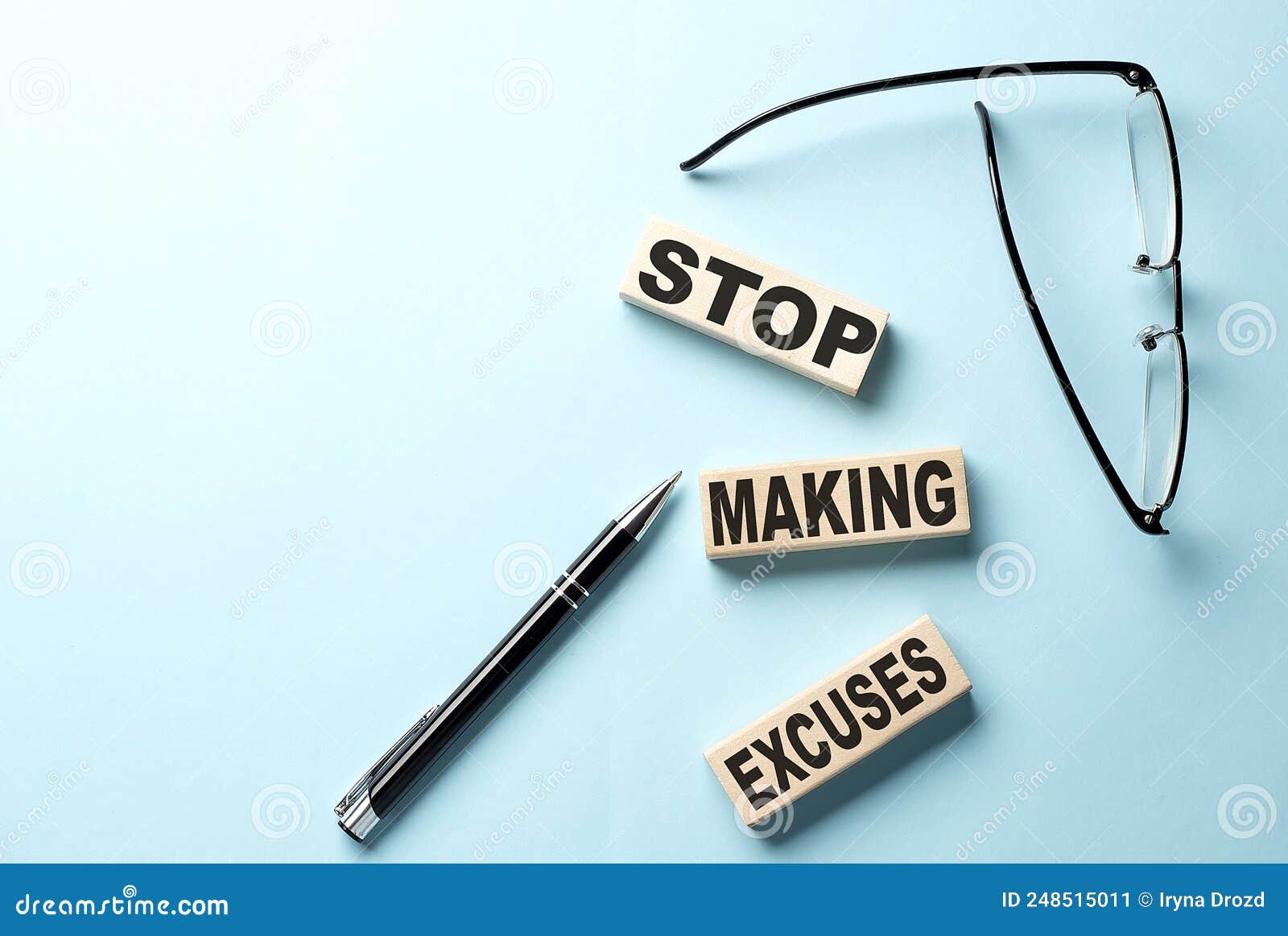 Text STOP MAKING EXCUSES Concept on Wooden Block on the Blue Background ... Text STOP MAKING EXCUSES Concept on Wooden Block on the Blue Background ...