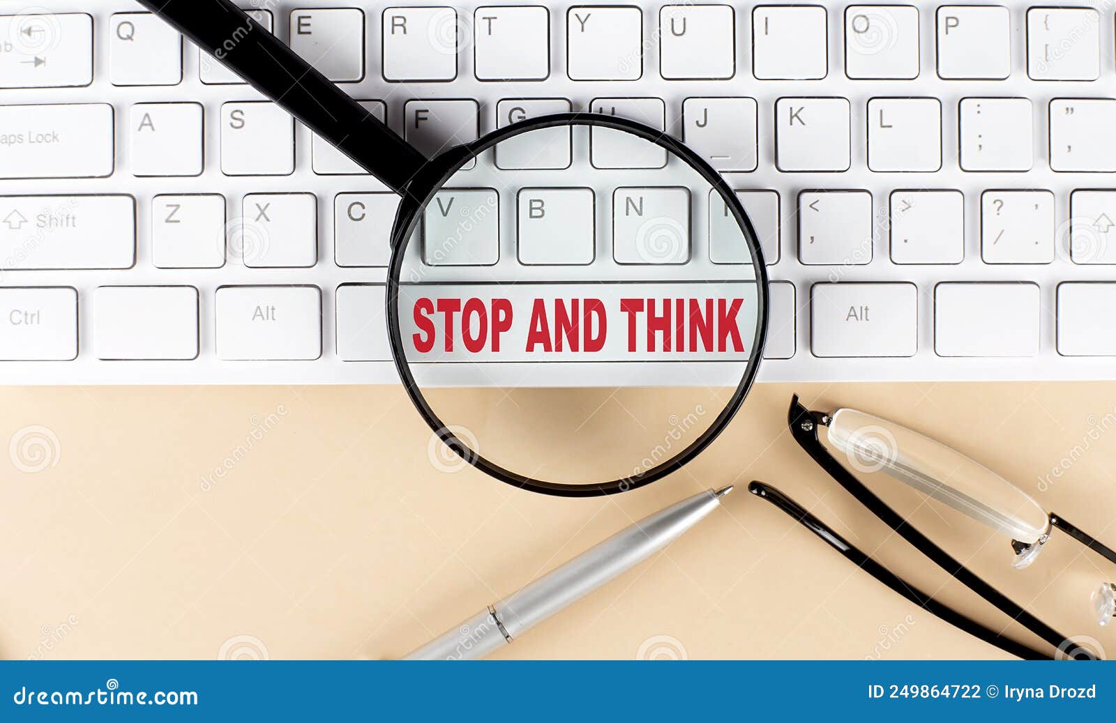 Text STOP and THINK on Keyboard with Magnifier , Glasses and Pen on ...