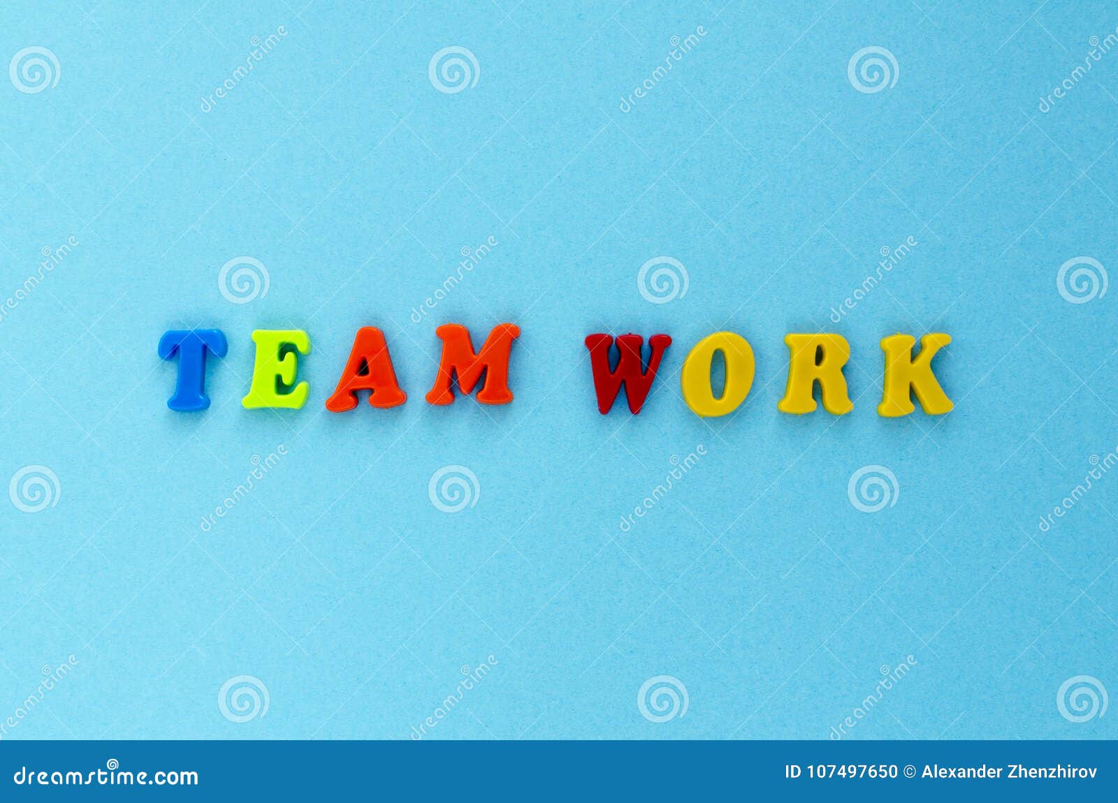 Text ` Team Work` of Plastic Magnetic Letters on Blue Background Stock ...