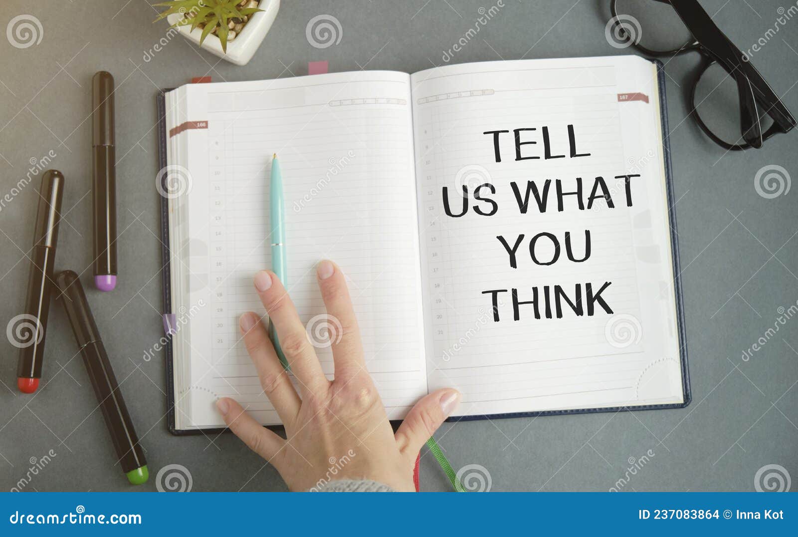 Text Tell Us What You Think in Notebook on White Stock Photo - Image of ...