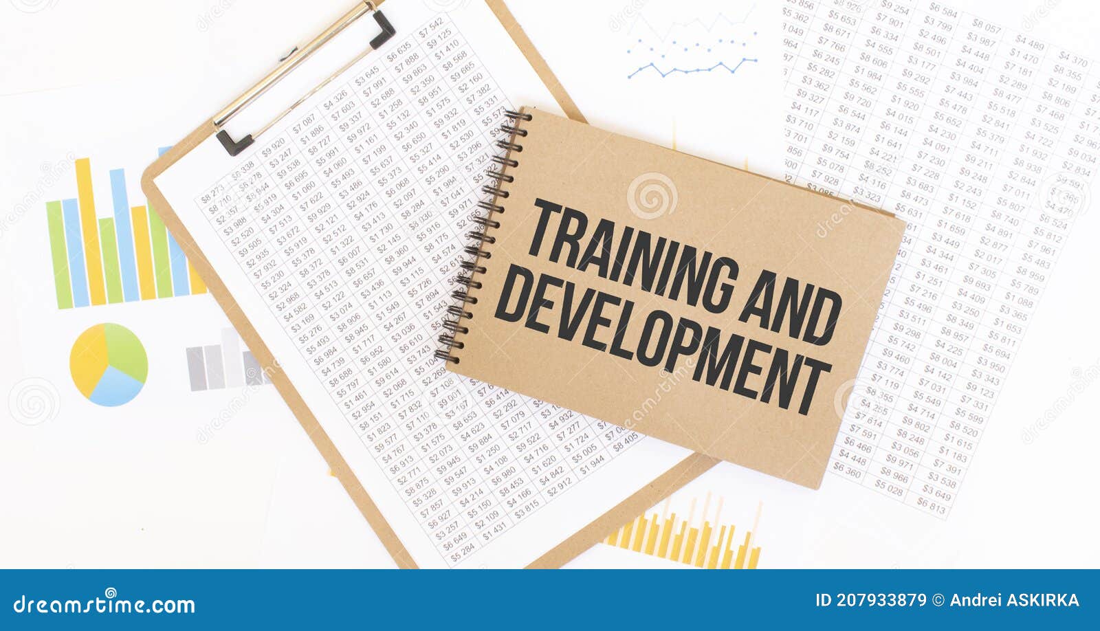 Text Training and Development on Brown Paper Notepad on the Table with ...