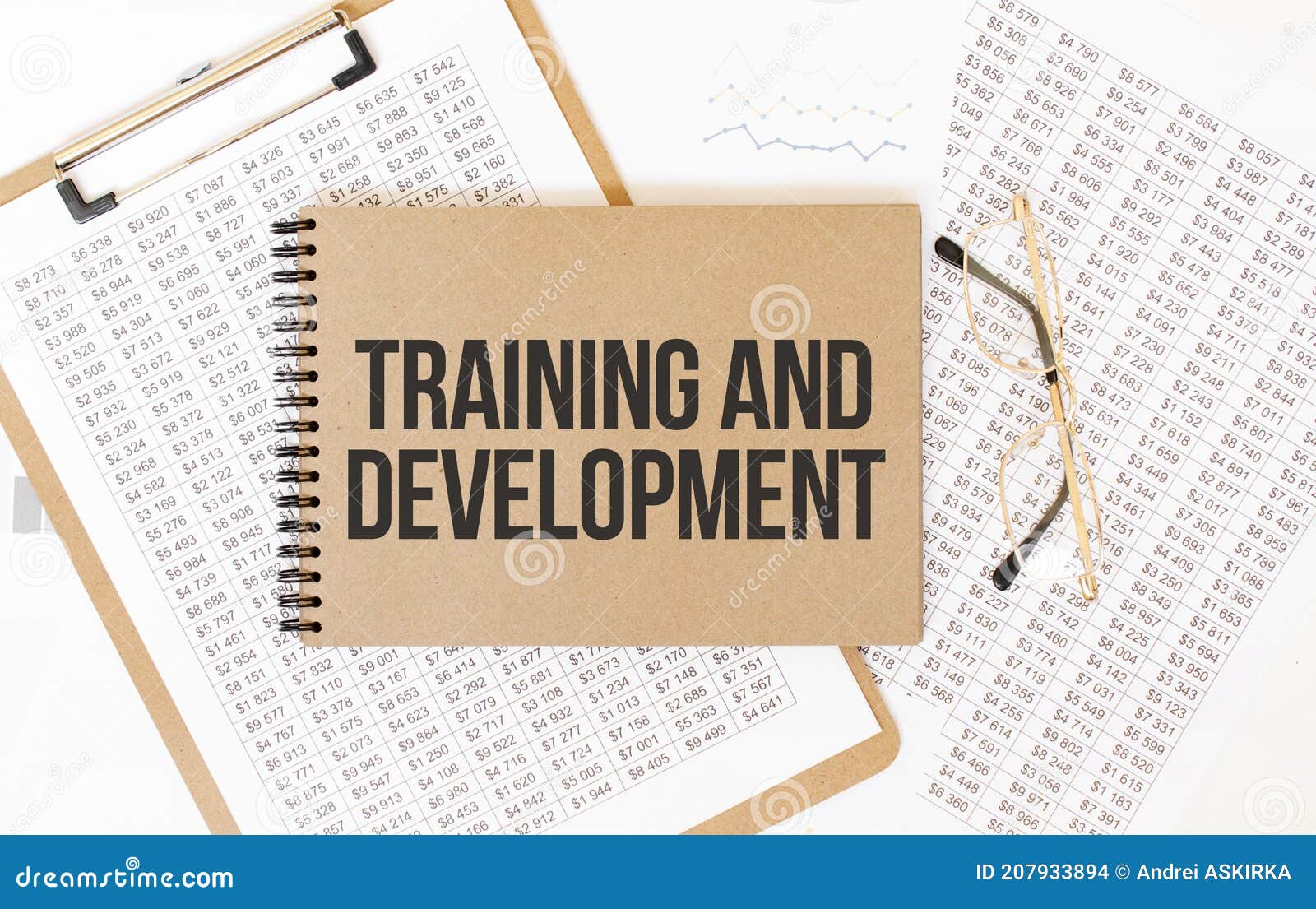 Text Training and Development on Brown Paper Notepad on the Table with ...