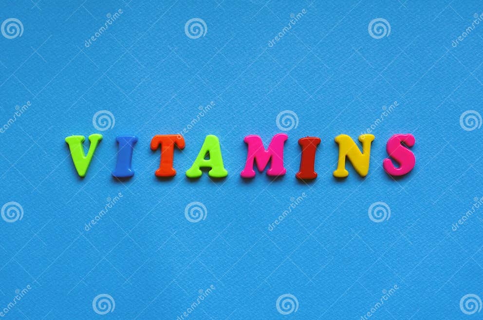 Text Vitaminsfrom Plastic Colored Letters on Blue Paper Background ...