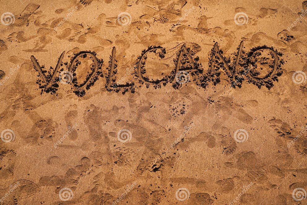 Text VOLCANO on Volcanic Sand. Texture, Wave Pattern of Ocean Sand on ...
