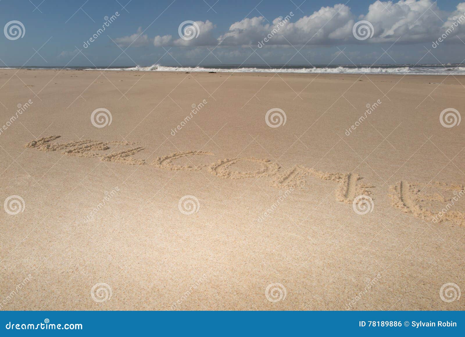 Text "welcome" on the Beach Sand with Ocean Waves on Background Stock ...