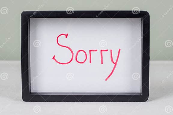 Text Word SORRY, Black Frame, on White Table. Stock Image - Image of ...
