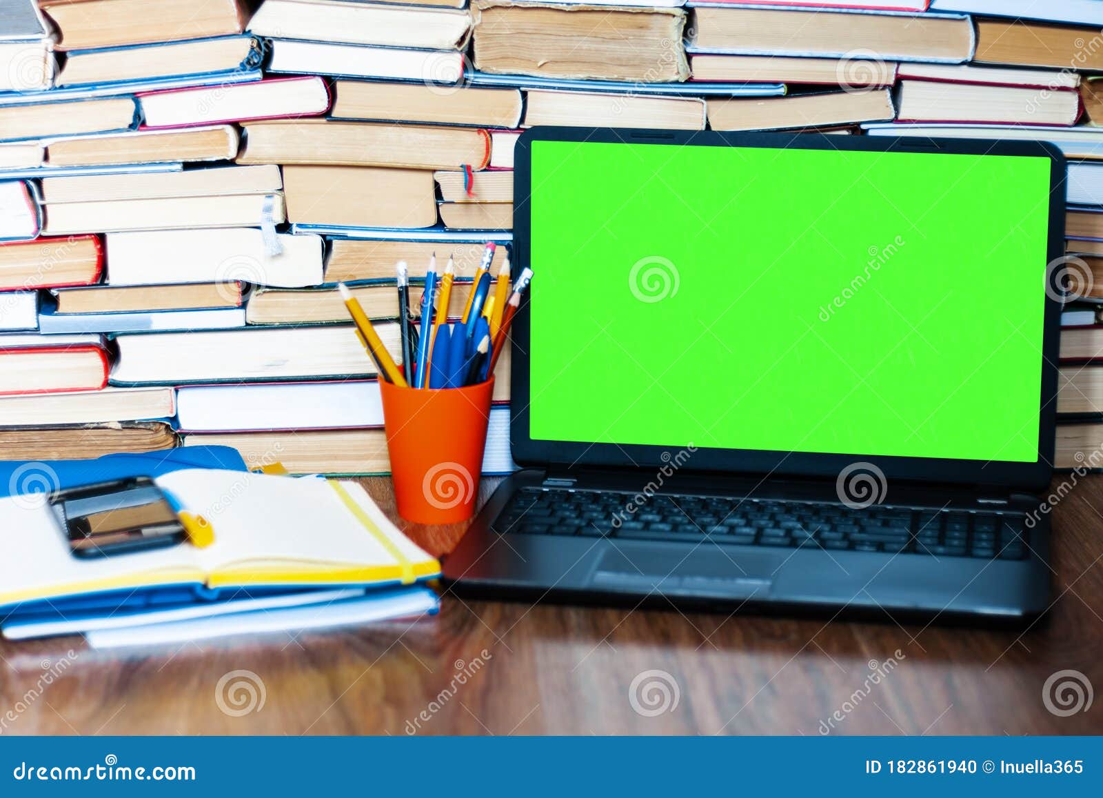 Textbook, Notebook, Green Screen Laptope and Stack of Books. Work from ...