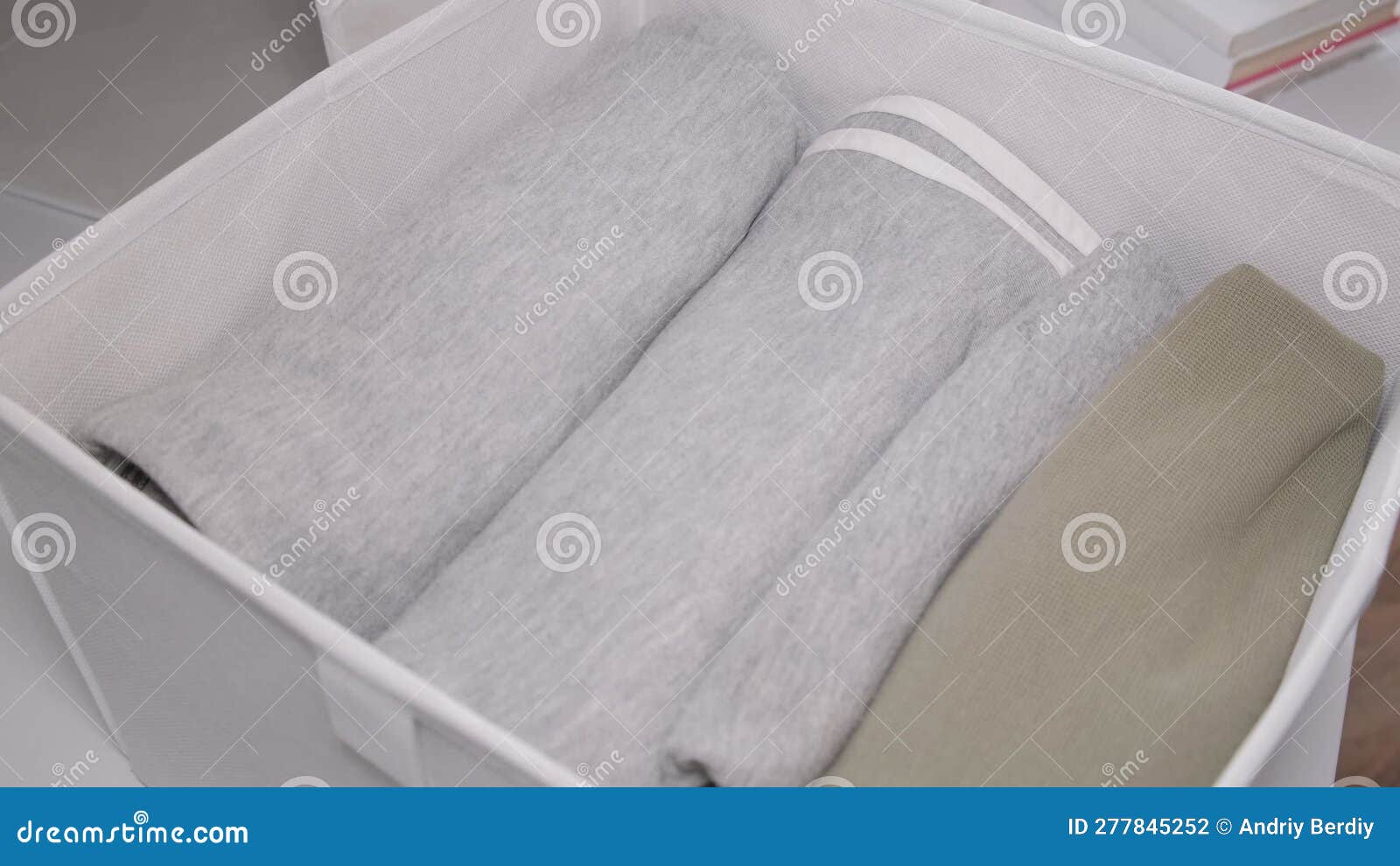 Textile Case and Organizer with Folded Clothes. the Concept of Order ...