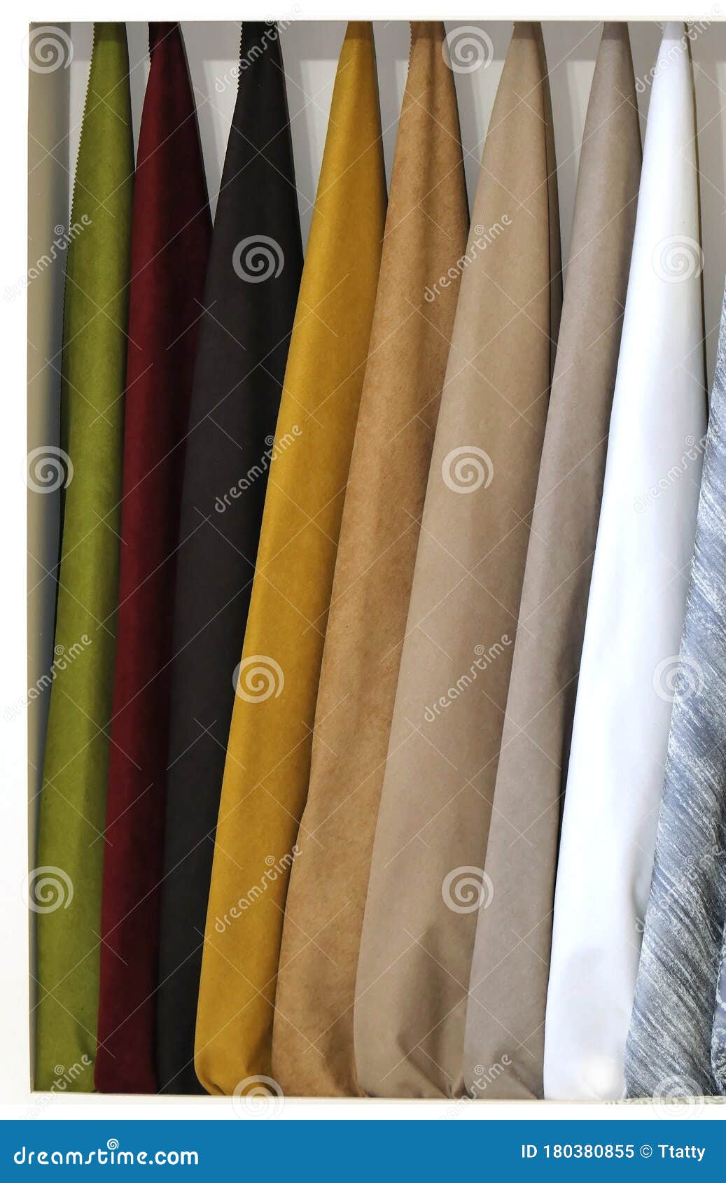 Textile samples on wall stock image. Image of fabric - 180380855