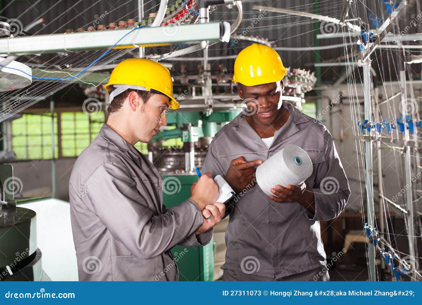 Textile workers discussing stock image. Image of blue - 27311073