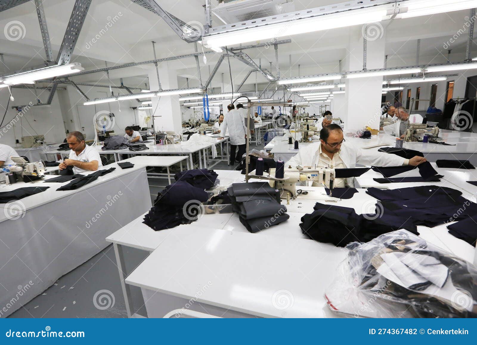 Textile Workers Work in a Textile Factory Editorial Photography - Image ...