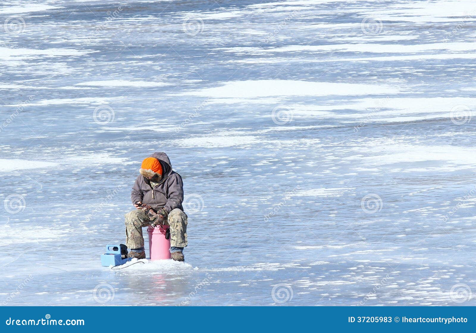 Ice Fishing and Texting stock image. Image of fisherman - 37205983