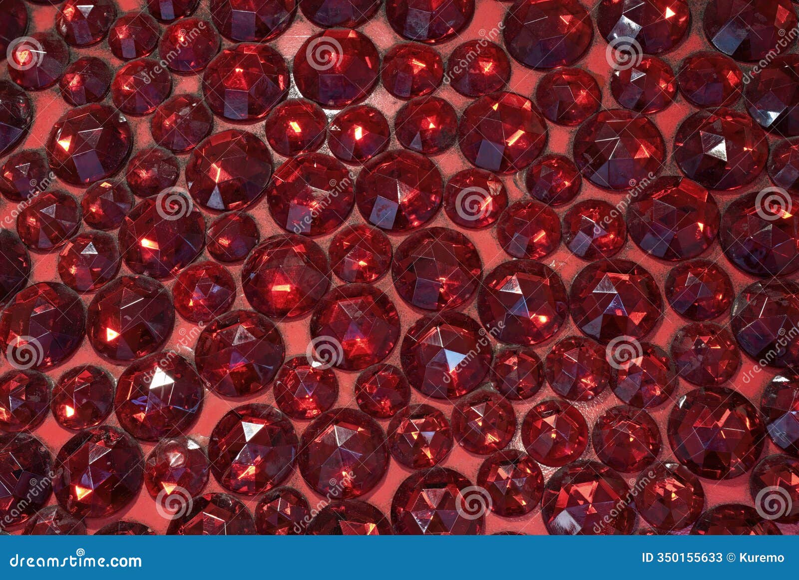 A Texture Background of Glittering Fake Red Ruby Gemstones Captured in ...