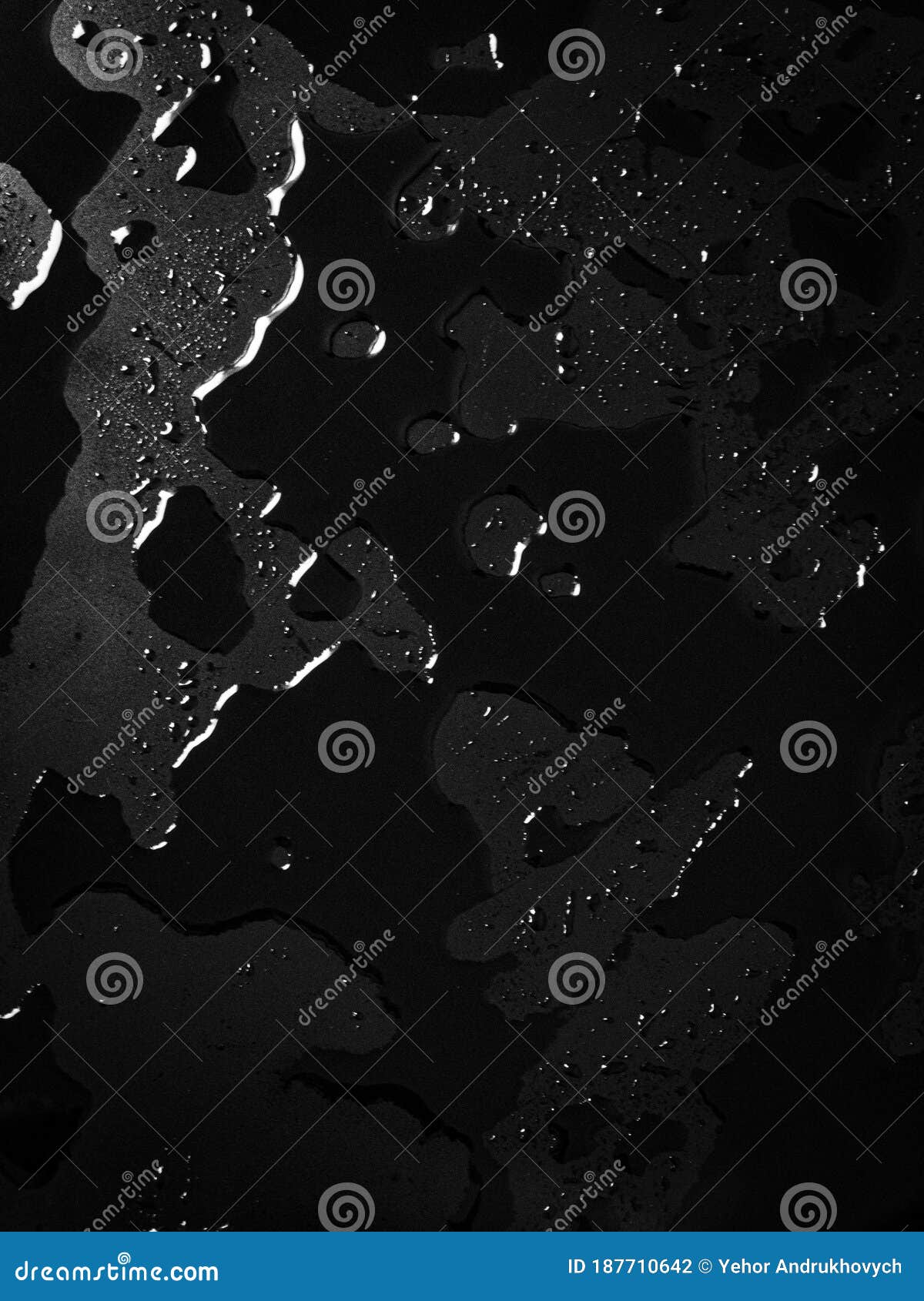 Texture Background Patterns of Water Spilled on a Black Flat Surface ...