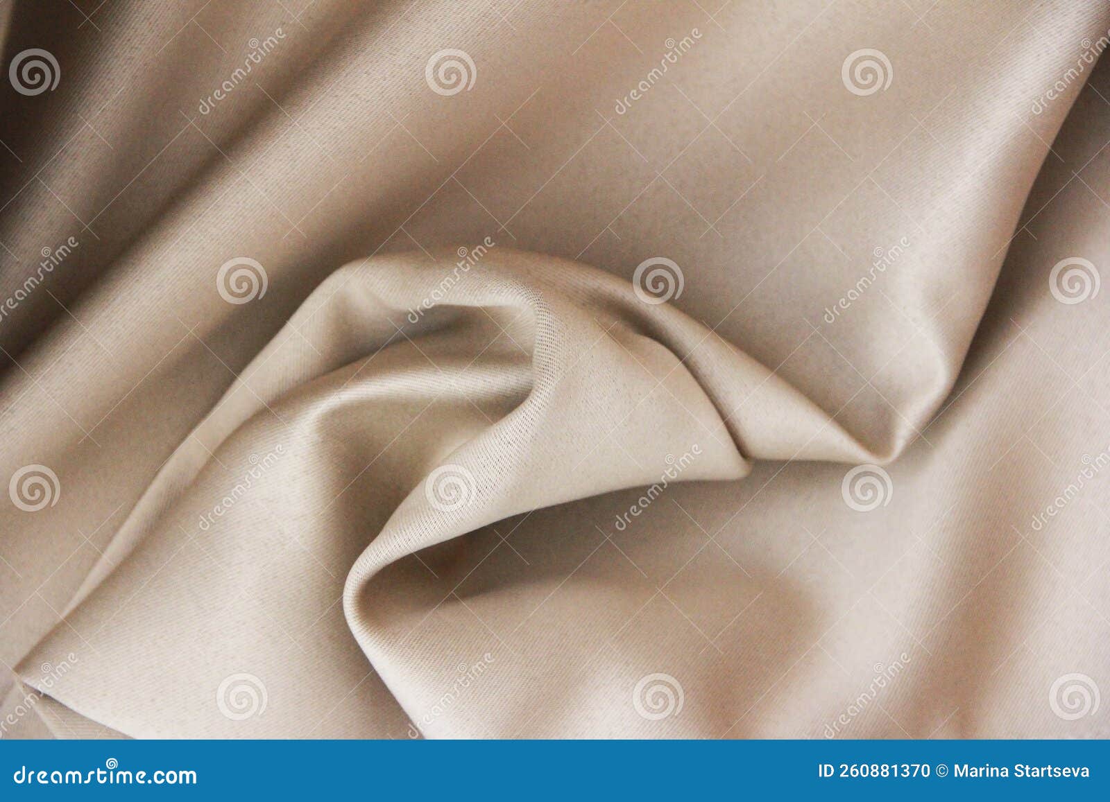 The Texture of Beige Satin Fabric with Folds and Bends Stock Photo ...