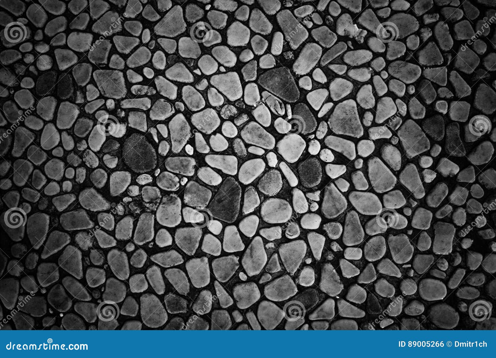 Texture of a Black Wall of Small Stones with Rounded Edges Stock Photo ...