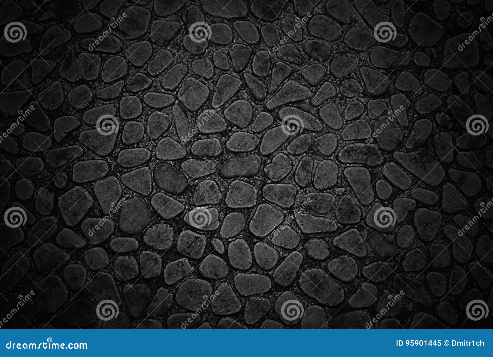 Texture of a Black Wall of Small Stones with Rounded Edges Stock Image ...