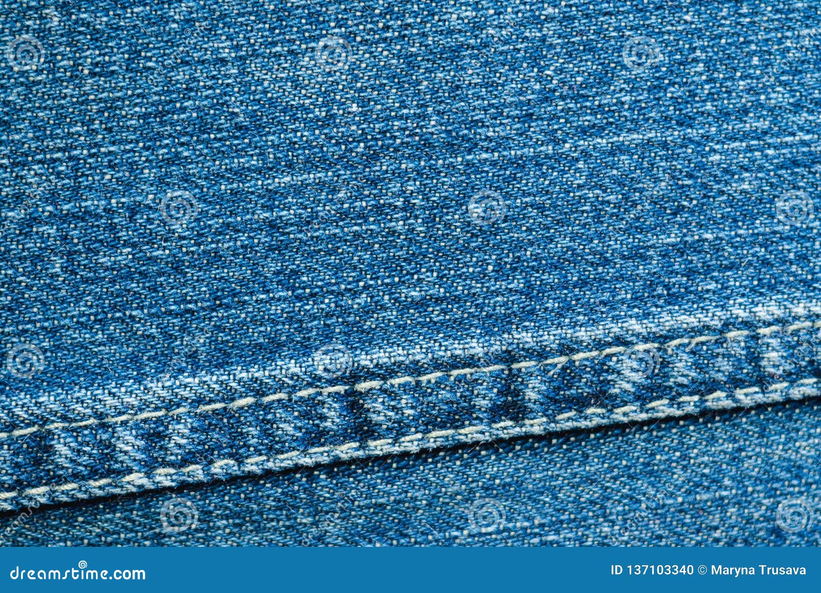 Texture of Blue Denim Material with a Seam Close-up Stock Photo - Image ...