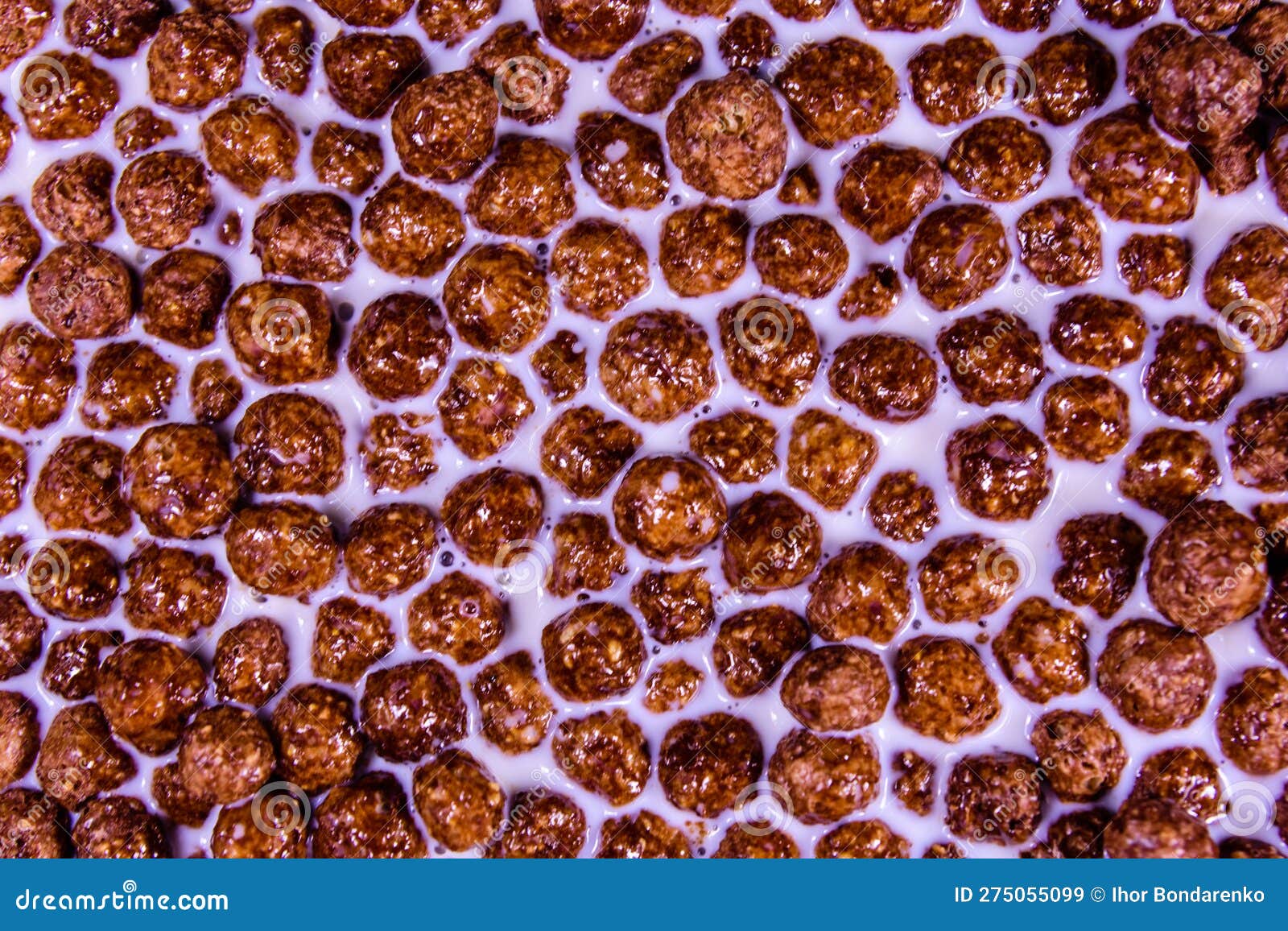Texture of Chocolate Cereal Balls in Milk for the Background Stock ...