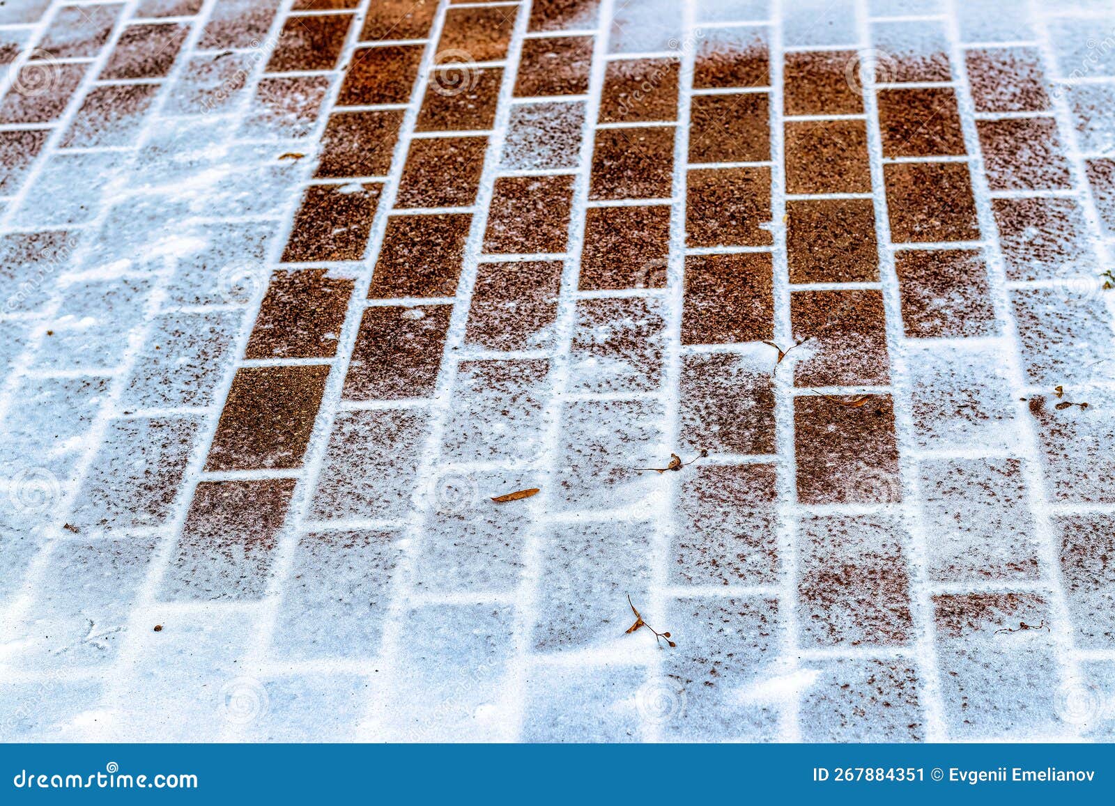 The Texture of the Cobblestone Path Covered with the First Snow in ...