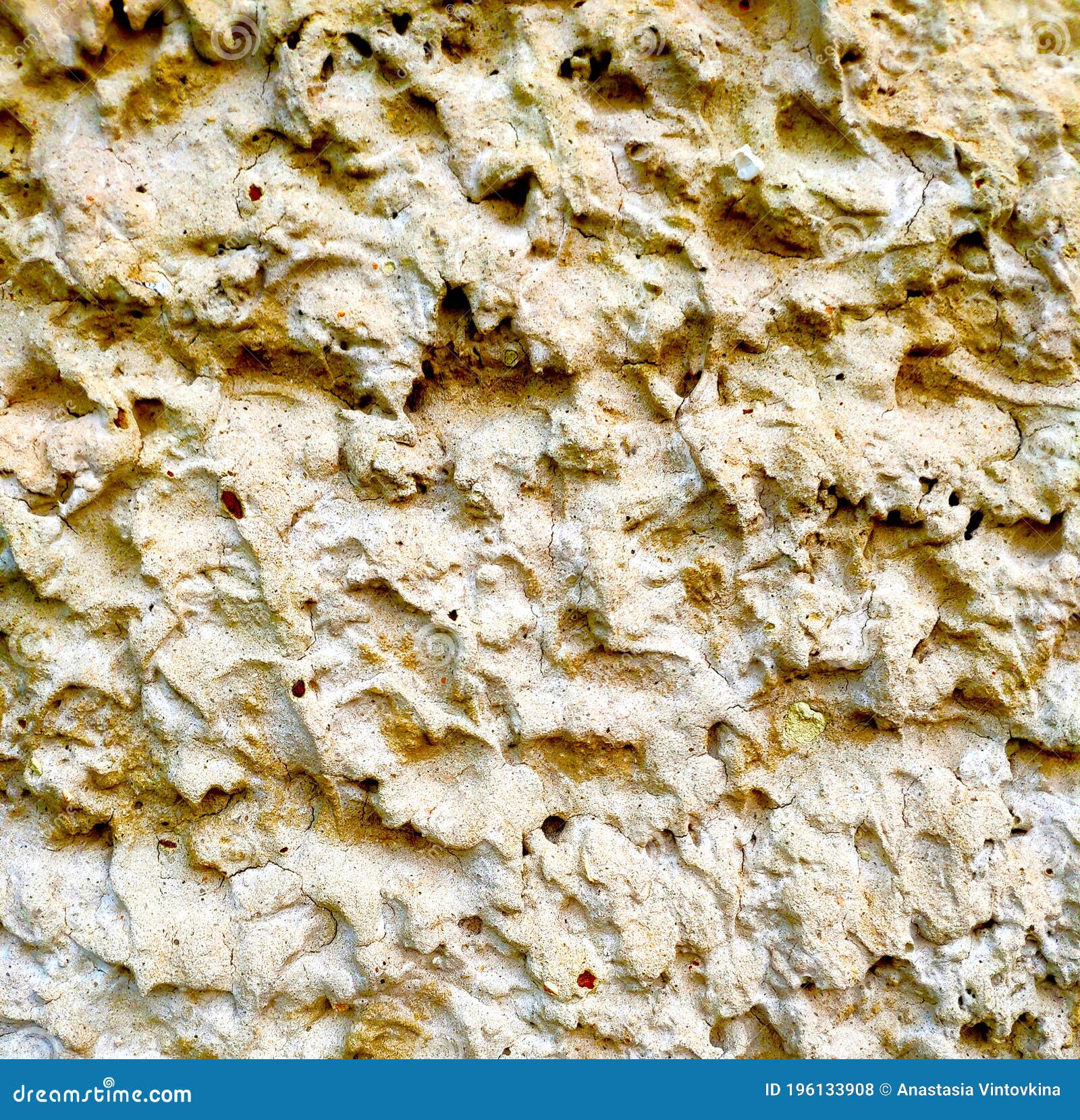 The Texture Of The Concrete Wall Is Sandy Yellow. Uneven Bumpy Surface ...