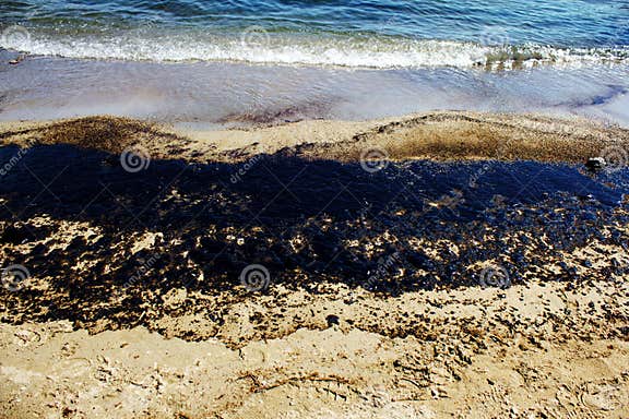 Texture Of Crude Oil Spill On Sand Beach From Oil Spill Accident Agios