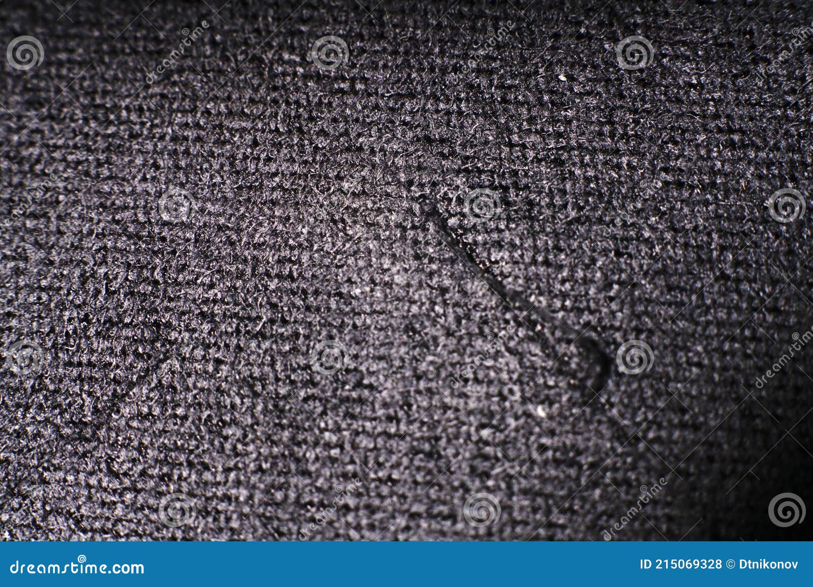 The Texture of a Dense Dark Fabric with a Protruding Thread Stock Photo ...