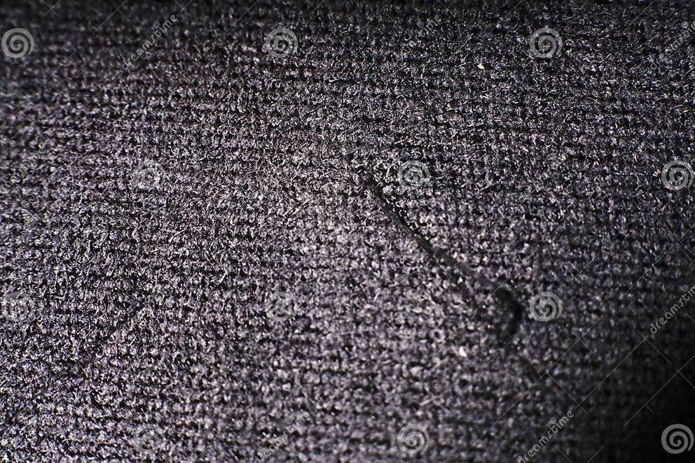 The Texture of a Dense Dark Fabric with a Protruding Thread Stock Photo ...