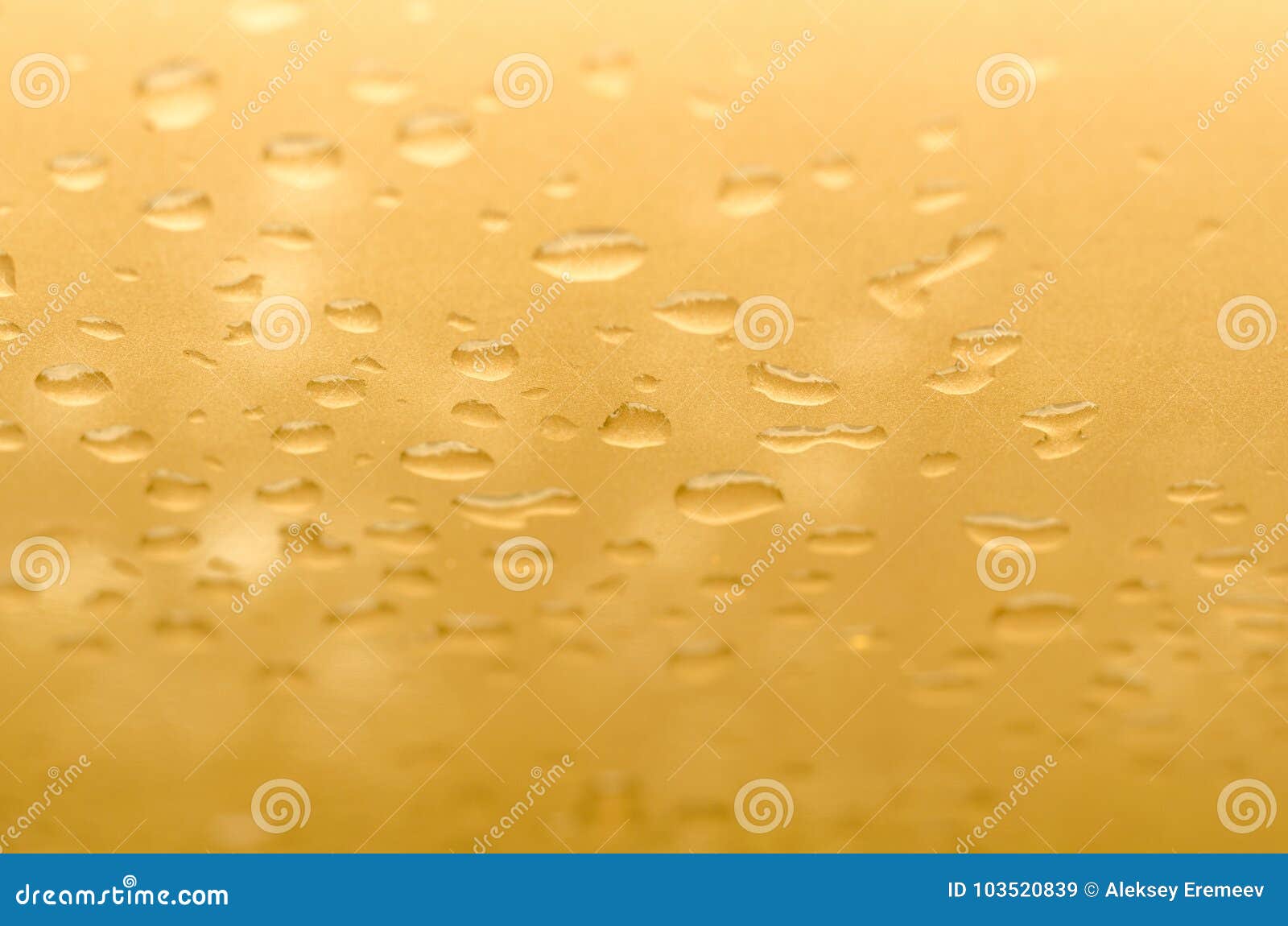 Texture of a Drop of Water on a Yellow Glossy Surface Stock Image ...