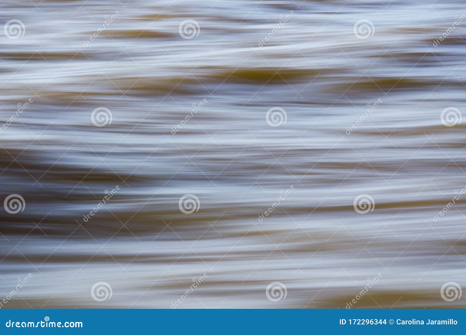 Texture of Fast Moving Water, in Yellowish Soft Tones Stock Photo ...