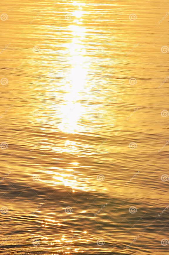 Texture Gold Water with Sun Reflection, Abstract Background. Stock ...