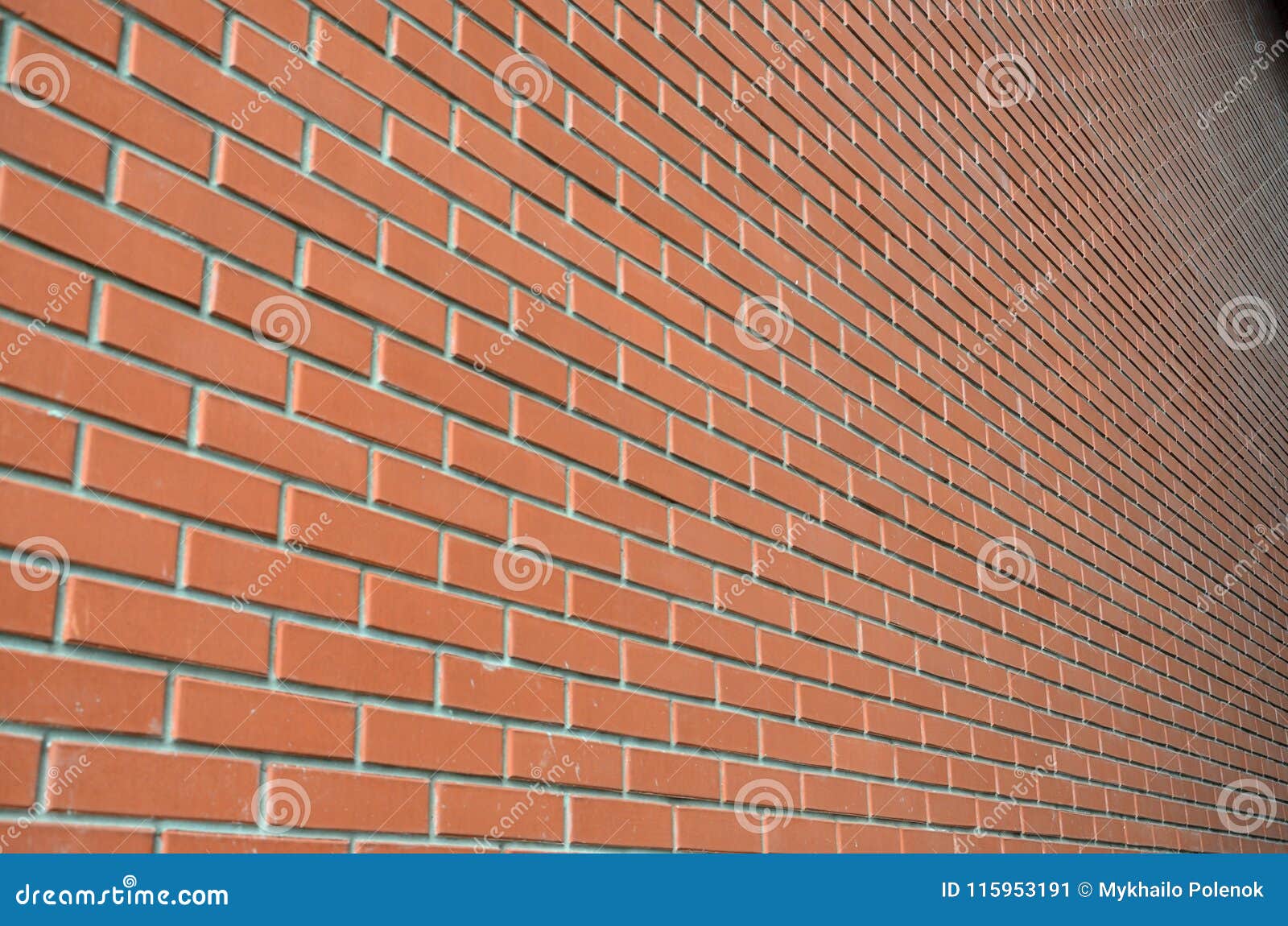 The Texture of a High Brick Wall from a Many Rows of Red Bricks ...