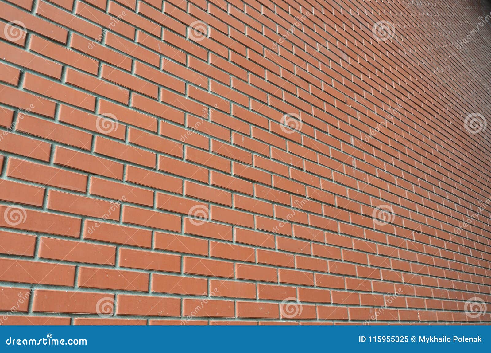 The Texture of a High Brick Wall from a Many Rows of Red Bricks ...