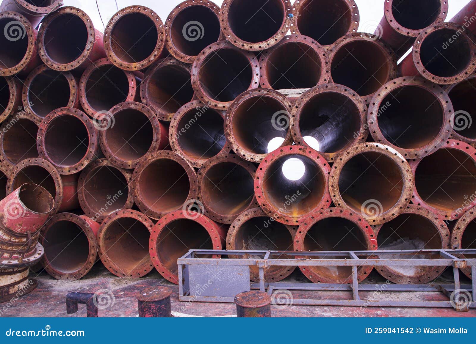 A Texture Industrial Background of Rusty Iron Pipes Stack Stock Photo ...