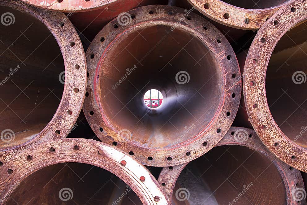A Texture Industrial Background of Rusty Iron Pipes Stack Stock Image ...
