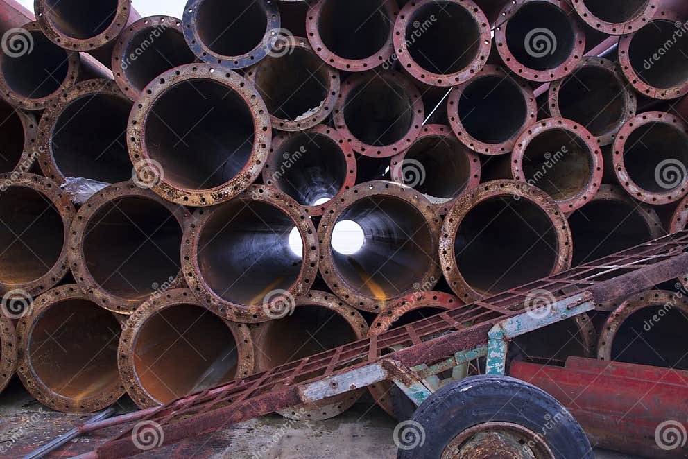 A Texture Industrial Background of Rusty Iron Pipes Stack Stock Image ...