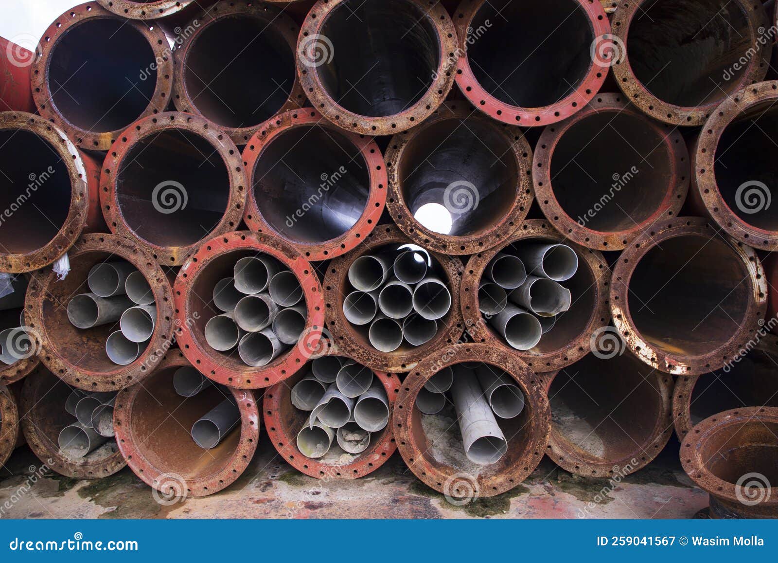 A Texture Industrial Background of Rusty Iron Pipes Stack Stock Image ...