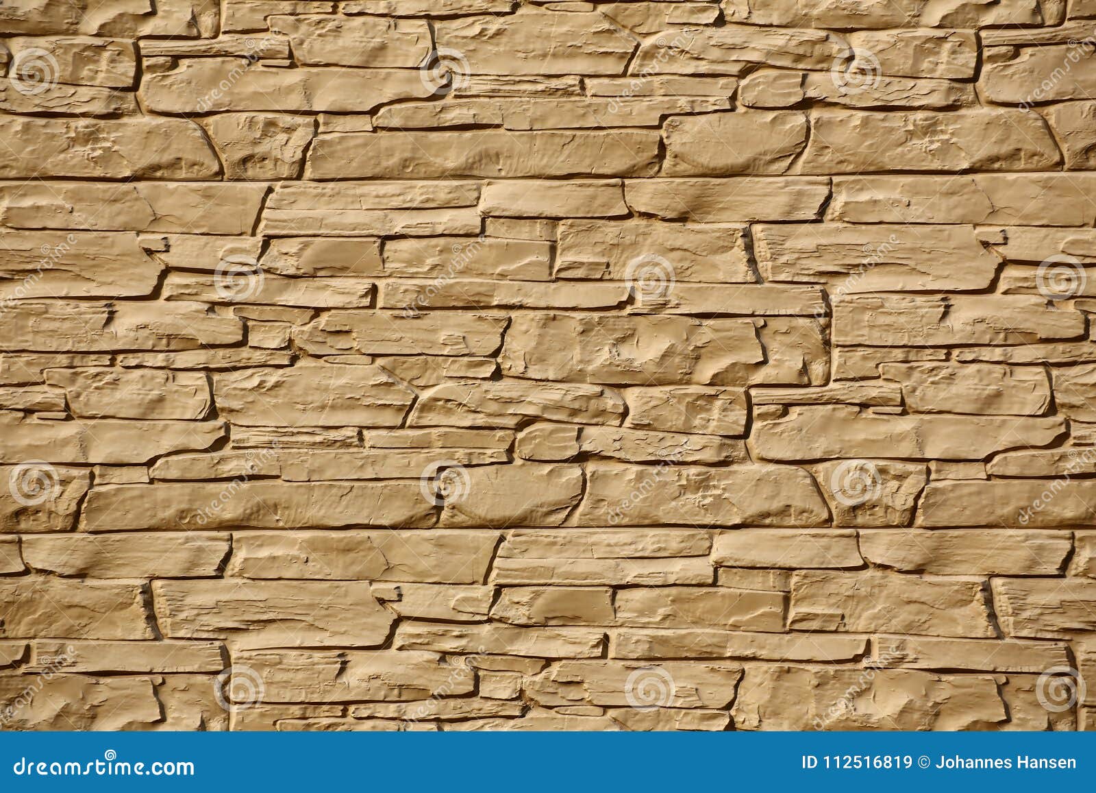 Texture of an Irregular Fieldstone Wall in Sunlight Stock Image - Image ...