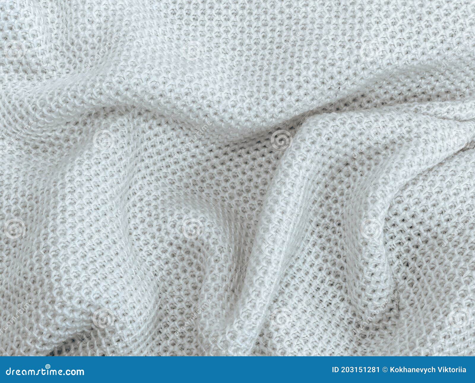 The Texture of a Knitted White Warm Sweater with Slightly Gathered ...