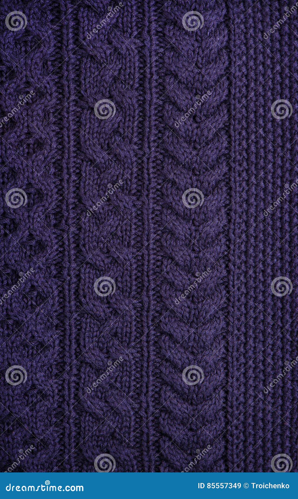 The Texture of Knitted Woolen Fabric Dark. Unusual Abstract Background ... The Texture of Knitted Woolen Fabric Dark. Unusual Abstract Background ...