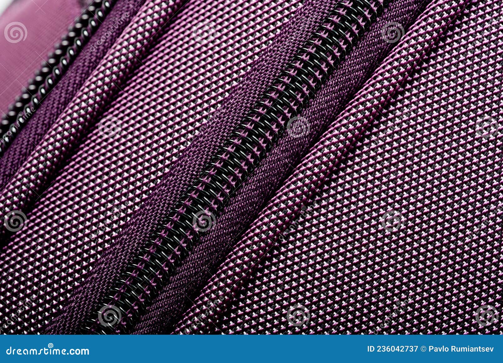 The Texture of the Material of the Suitcase is Purple with a Metal ...