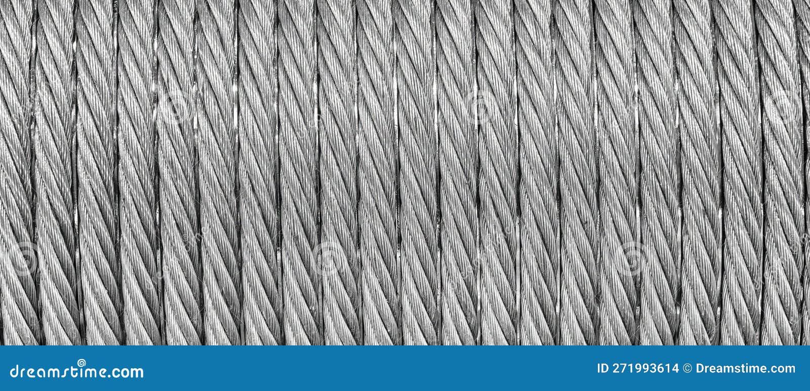 The Texture of a New Stainless Steel Cable Wrapped in a Spool. Abstract ...