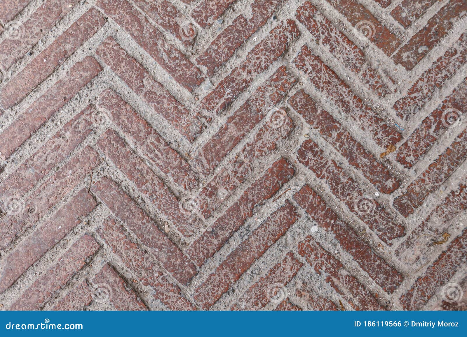 The Texture of the Old Herringbone Pavement of Bricks Stock Photo ...