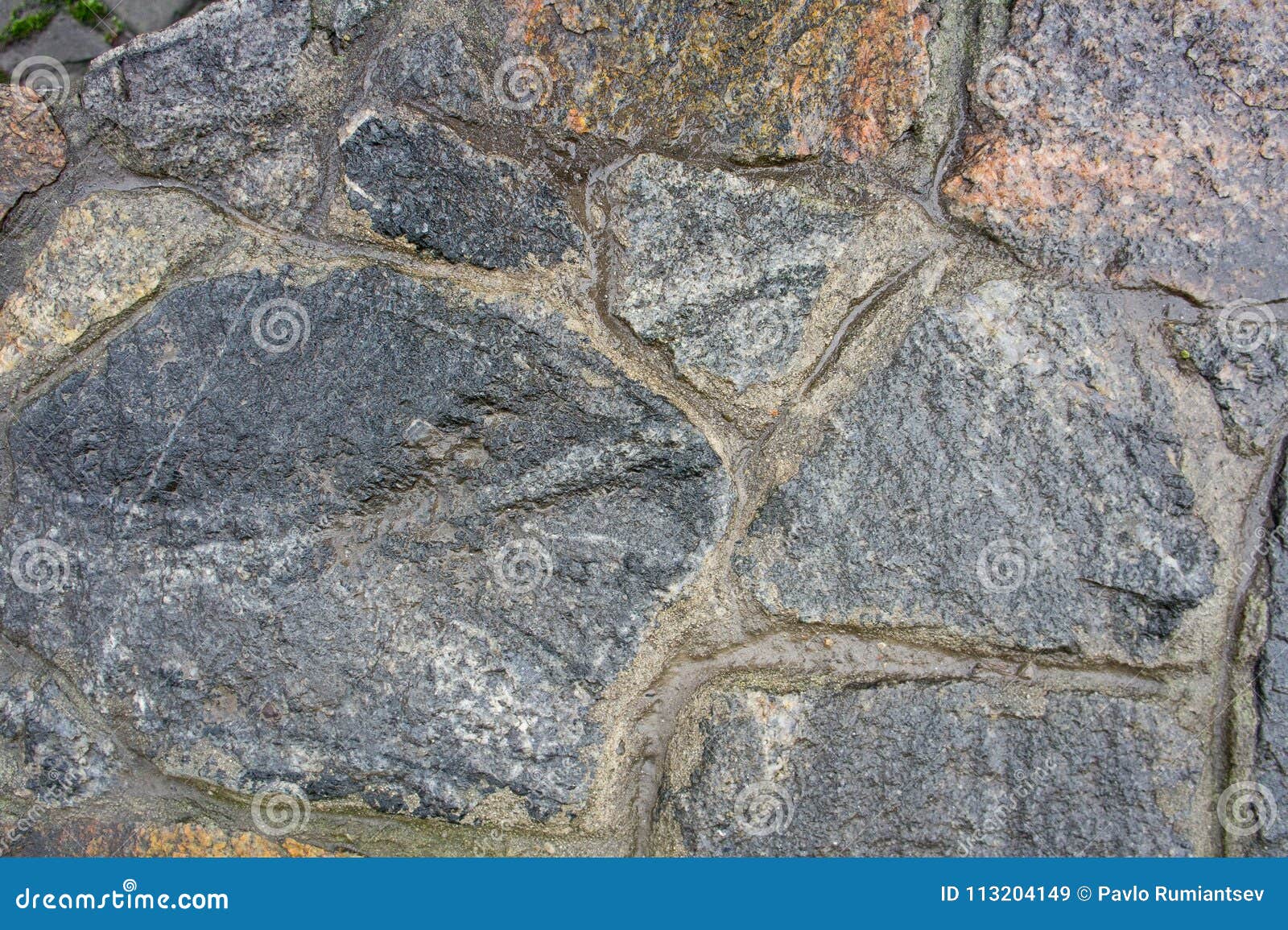 The Texture of the Old, Wet Granite in the Masonry of the Wall Stock ...