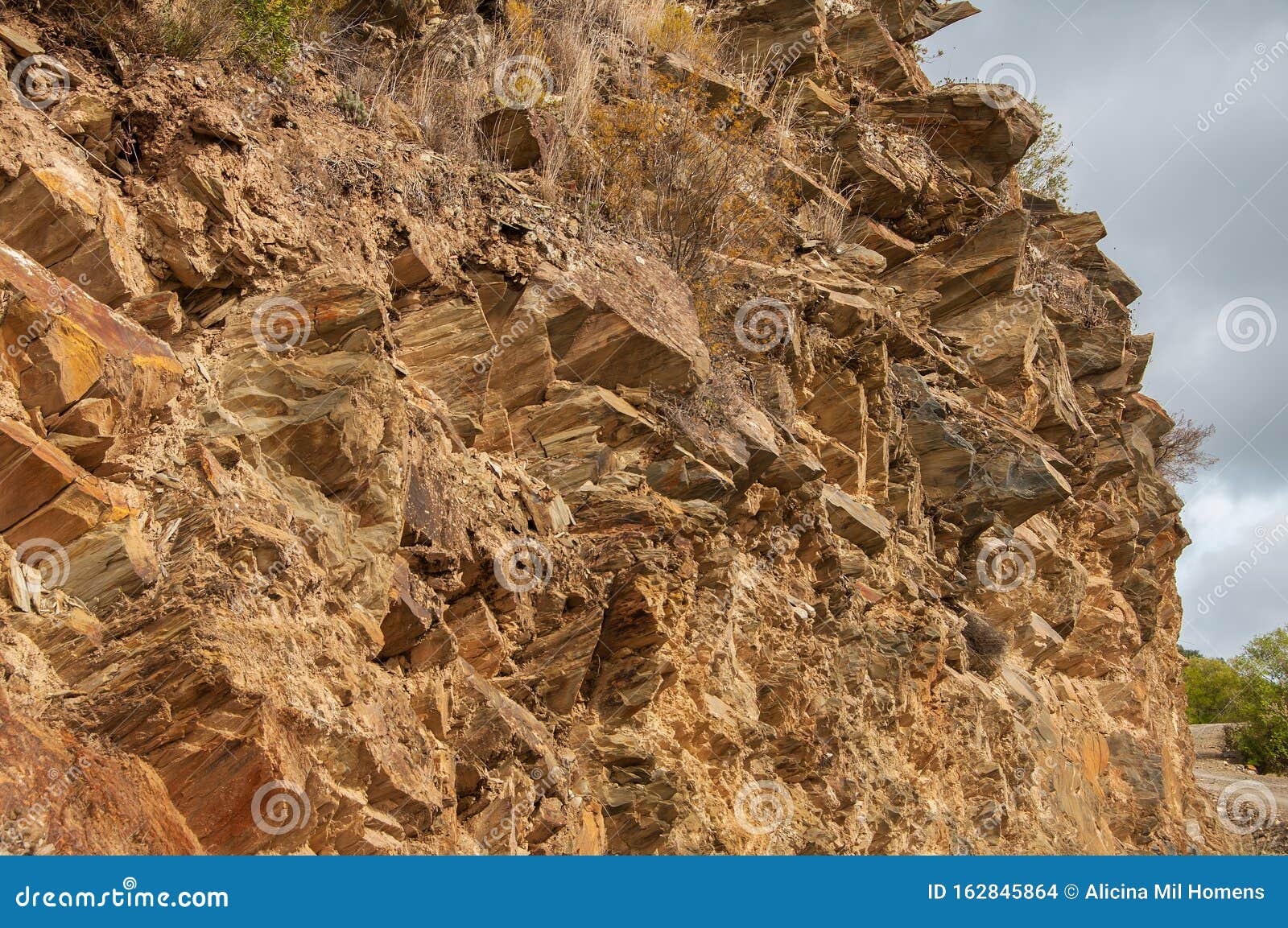 Texture and Pattern of a Large Stone Wall in a Mountain Stock Photo ...
